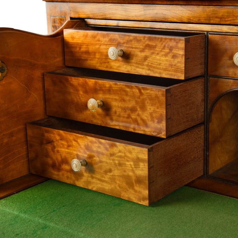 A fine late George III satinwood and snakewood secretaire cabinet ...