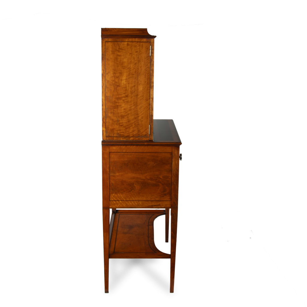 A fine late George III satinwood and snakewood secretaire cabinet ...
