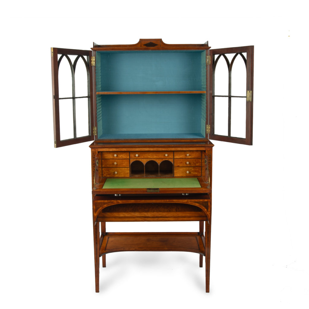 A fine late George III satinwood and snakewood secretaire cabinet ...